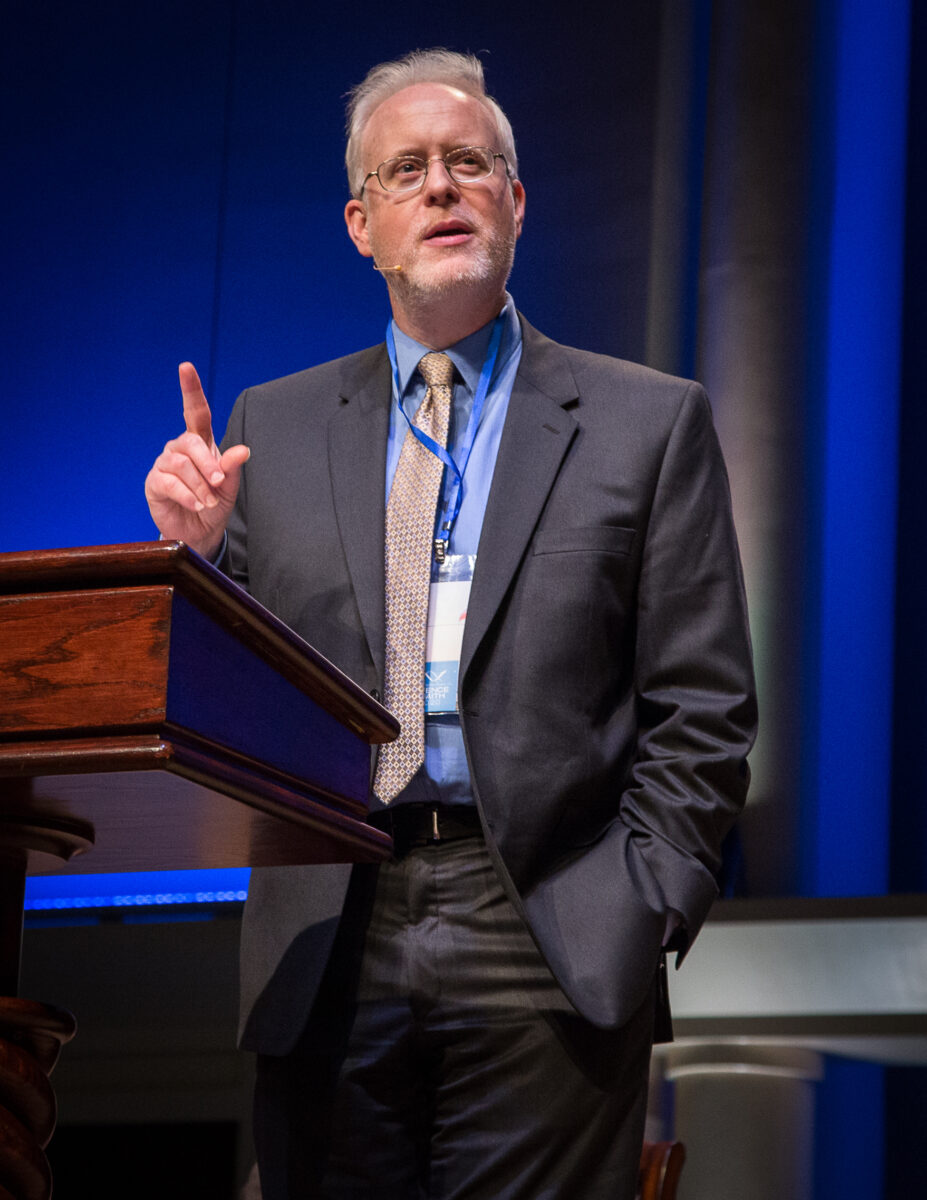 About | John G. West